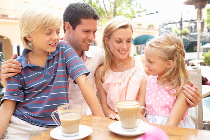 Young Family Enjoying Cup of Coffee Stock Image - Image of caucasian ...