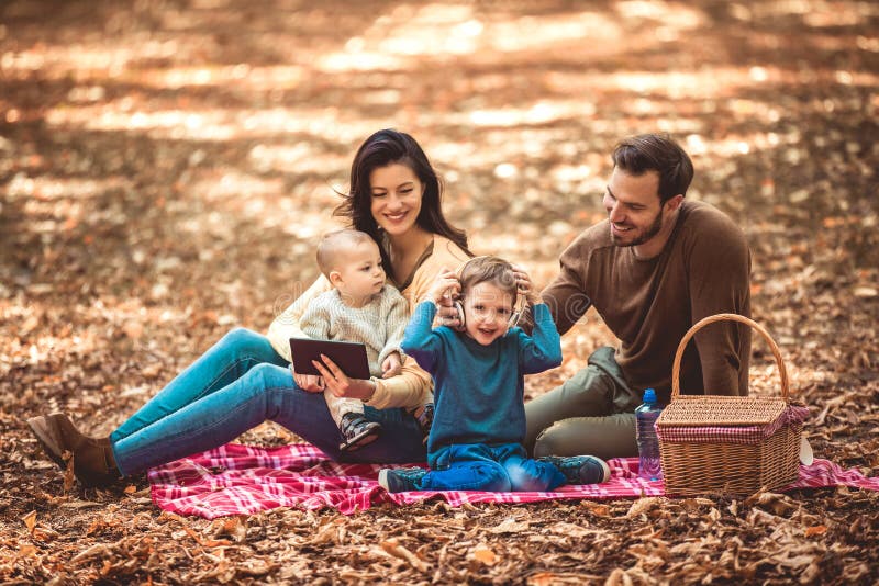 Family Having Fun in the Autumn Park. Stock Image - Image of happiness ...