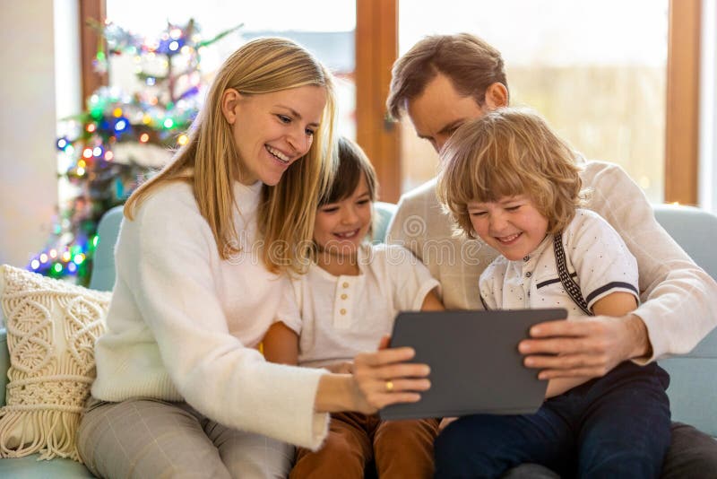 Young Family Having Fun with Digital Tablet Stock Photo - Image of ...