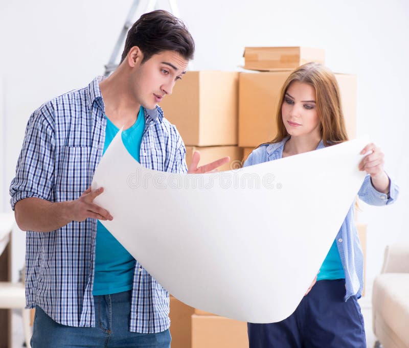 Young Family Planning Home DIY Renovation with Drawing Stock Image ...