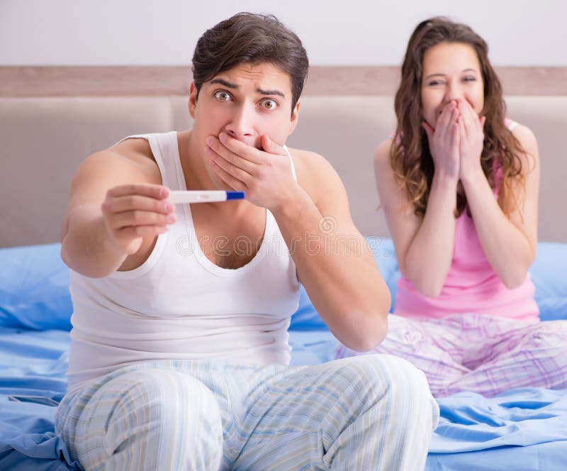 Young Family with Pregnancy Test Results Stock Photo - Image of ...