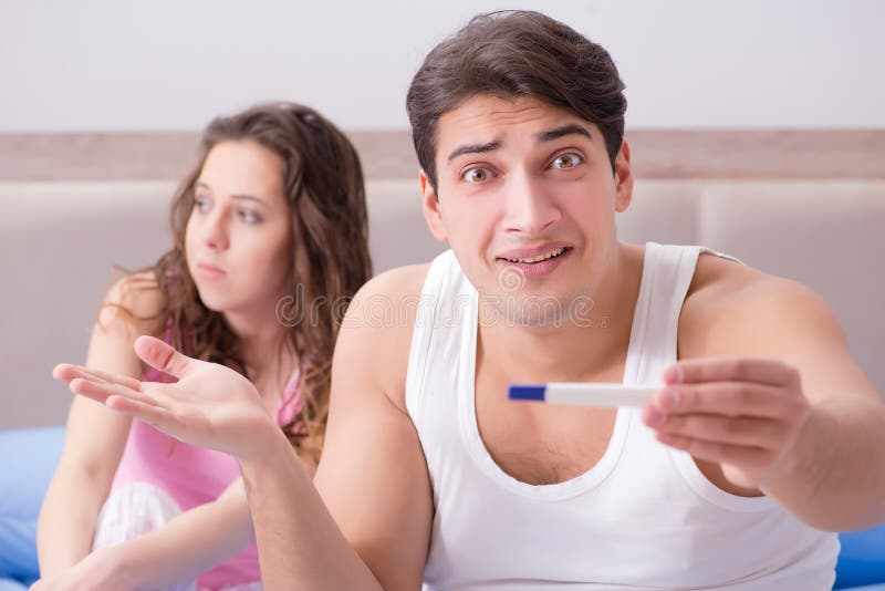 The Young Family with Pregnancy Test Results Stock Image - Image of ...