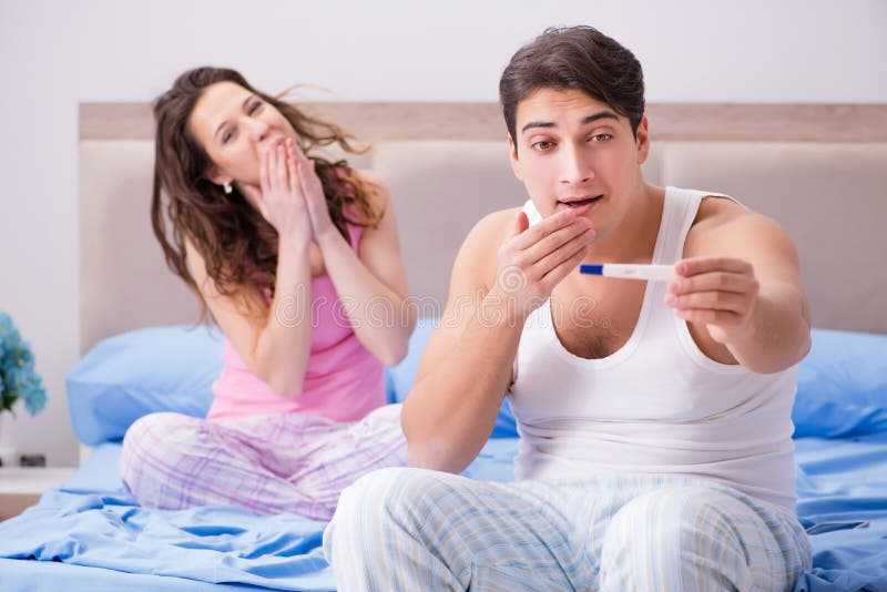 The Young Family with Pregnancy Test Results Stock Photo - Image of ...