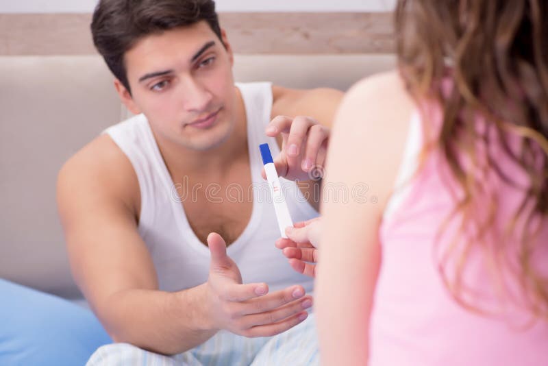 The Young Family with Pregnancy Test Results Stock Image - Image of ...