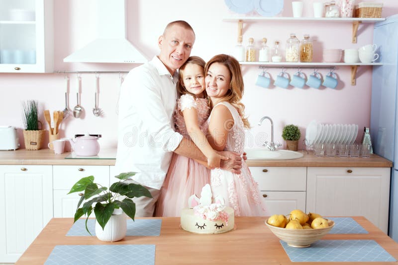 Young Family are Standing in a Beautiful Kitchen Stock Photo - Image of ...