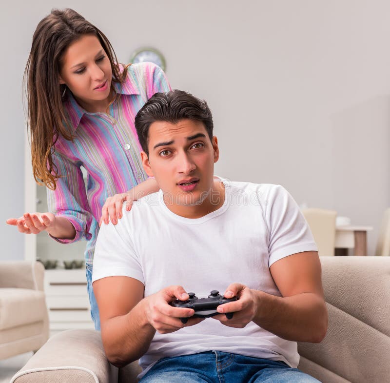 Young Family Suffering from Computer Games Addiction Stock Photo ...