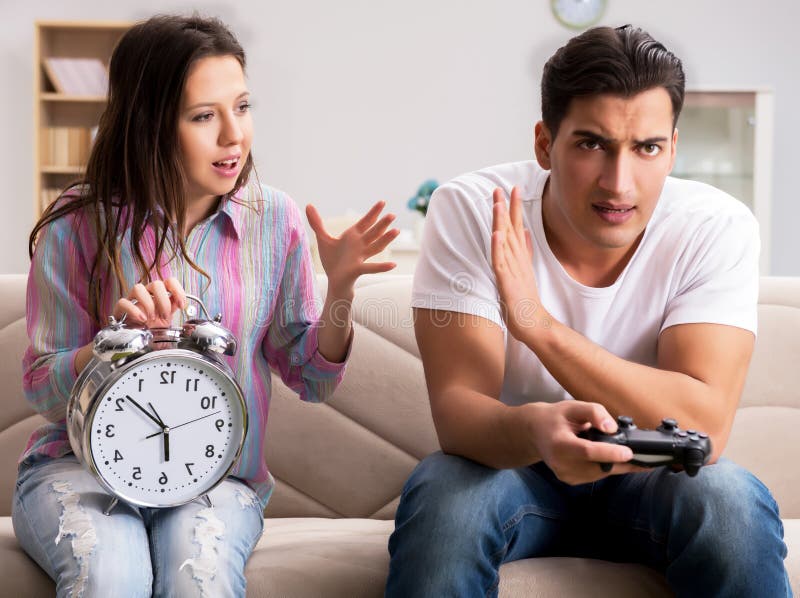 Young Family Suffering from Computer Games Addiction Stock Photo ...