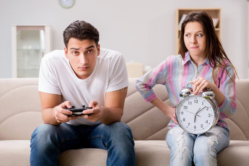 The young family suffering from computer games addiction - Stock Image ...