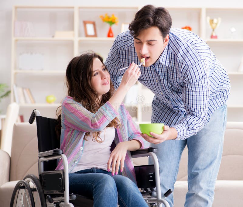 The Young Family Taking Care of Each Other Stock Photo - Image of ...