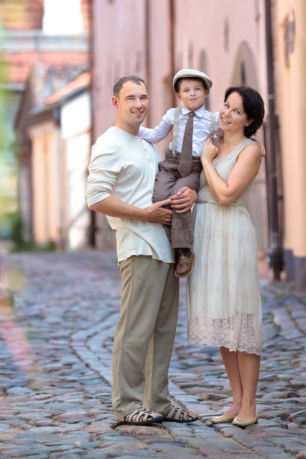 Young Family of Three in City Street Stock Image - Image of latvia ...