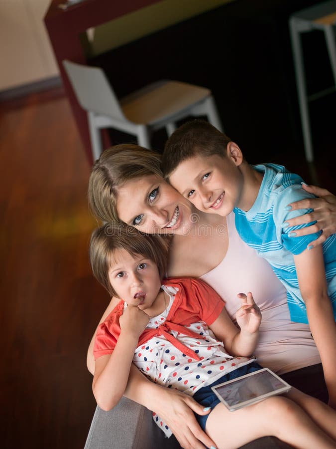 Young Family Using a Tablet To Make Future Plans Stock Image - Image of ...