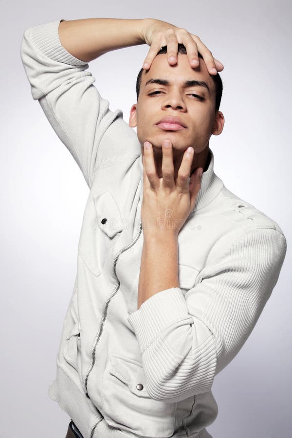 Young Fashion Male Model on Gray Background. Stock Photo - Image of ...