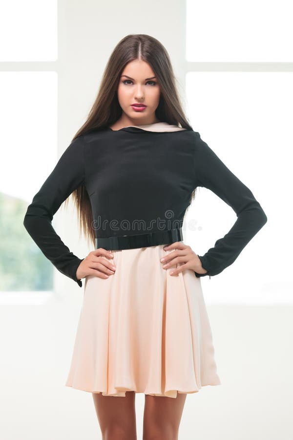 Young Fashion Woman Holds Hands on Hips Stock Photo - Image of dress ...