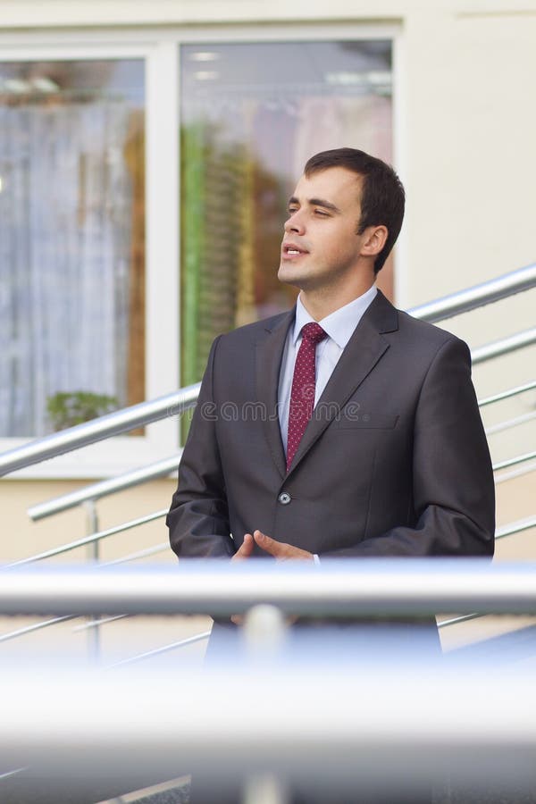Unhappy Businessman in Hat Gesturing Stock Photo - Image of businessman ...