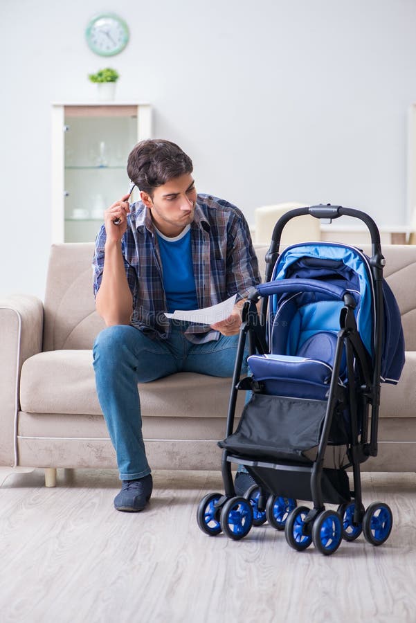 The Young Father Assembling Baby Pram at Home Stock Image - Image of ...