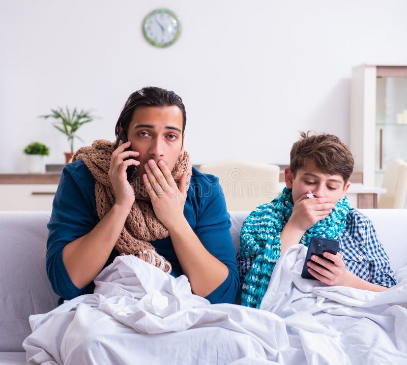 Young Father Caring for Sick Son Stock Image - Image of infection ...