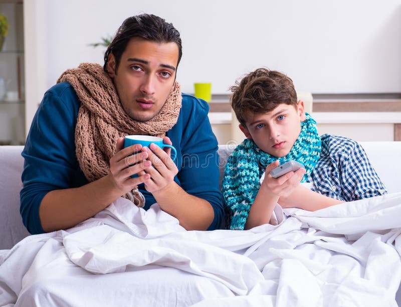 Young Father Caring for Sick Son Stock Photo - Image of contagious ...