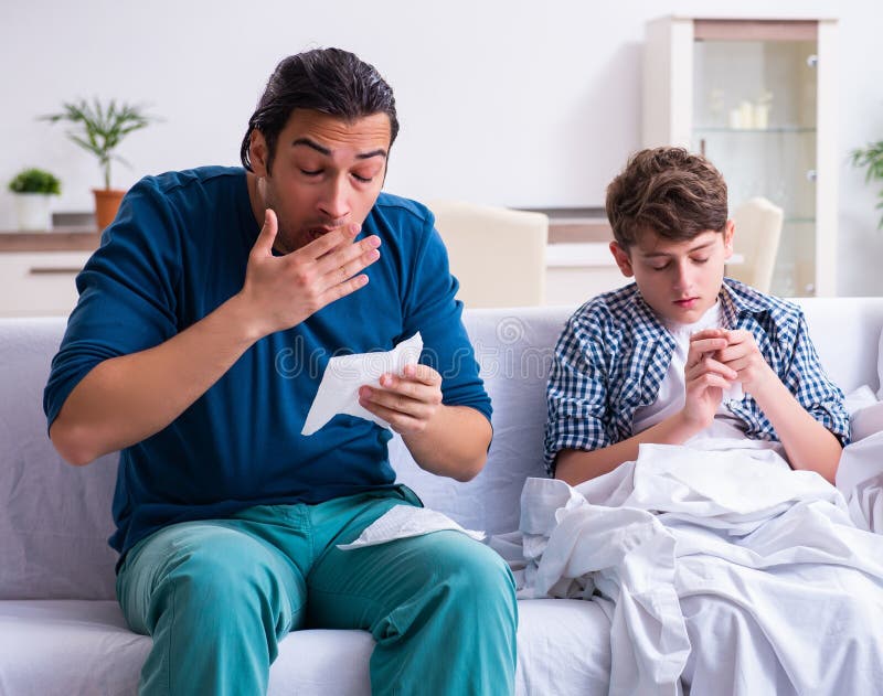 Young Father Caring for Sick Son Stock Image - Image of disease ...