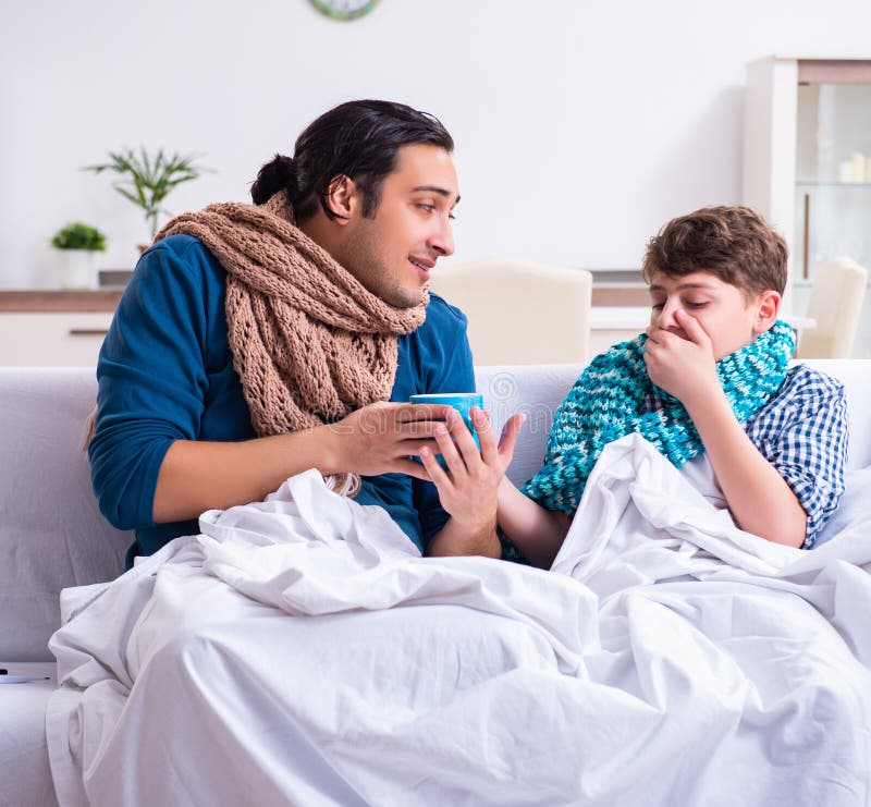 Young Father Caring for Sick Son Stock Photo - Image of allergy ...
