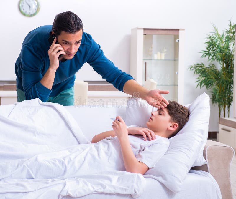 Young Father Caring for Sick Son Stock Image - Image of cold, leave ...