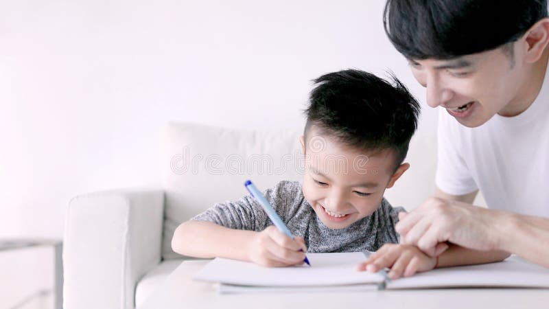 Young Father Checking Homework Helping Child with Study at Home Stock ...