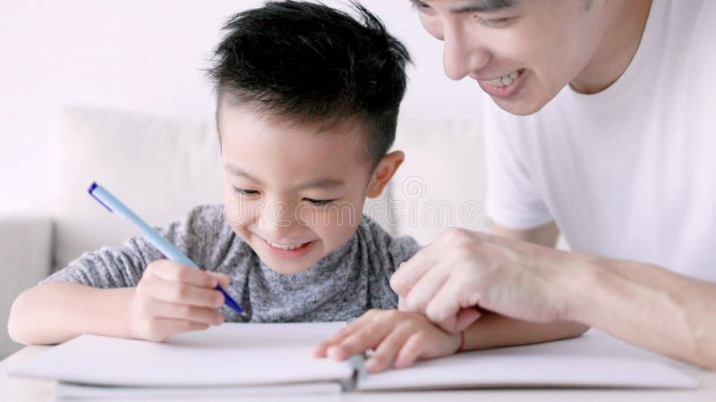 Young Father Checking Homework Helping Child with Study at Home Stock ...