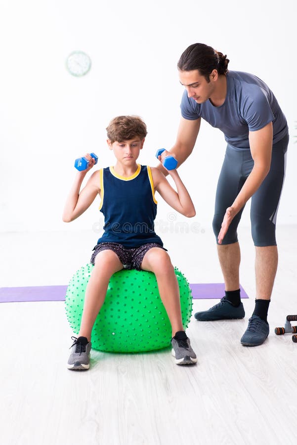 Young Father and His Son Doing Exercises Stock Image - Image of body ...