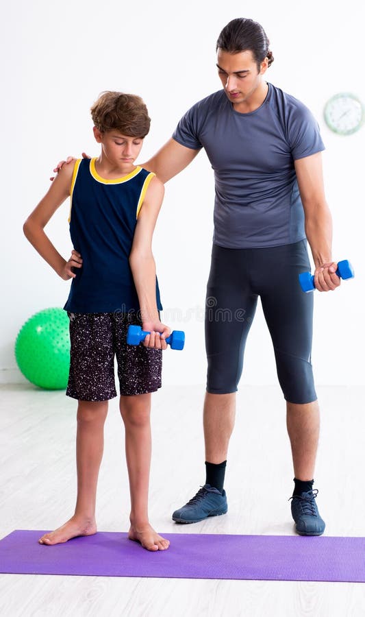 Young Father and His Son Doing Exercises Stock Image - Image of ...