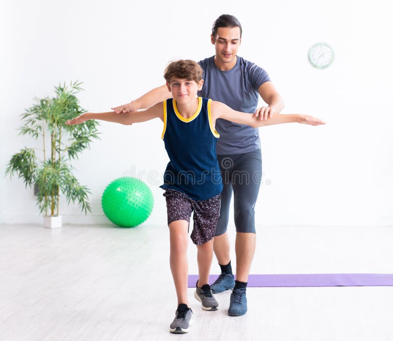 Young Father and His Son Doing Exercises Stock Photo - Image of ...