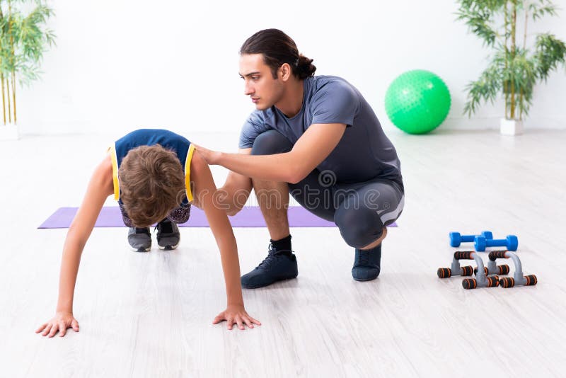 Young Father and His Son Doing Exercises Stock Photo - Image of coach ...