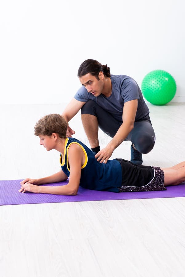 Young Father and His Son Doing Exercises Stock Photo - Image of parent ...