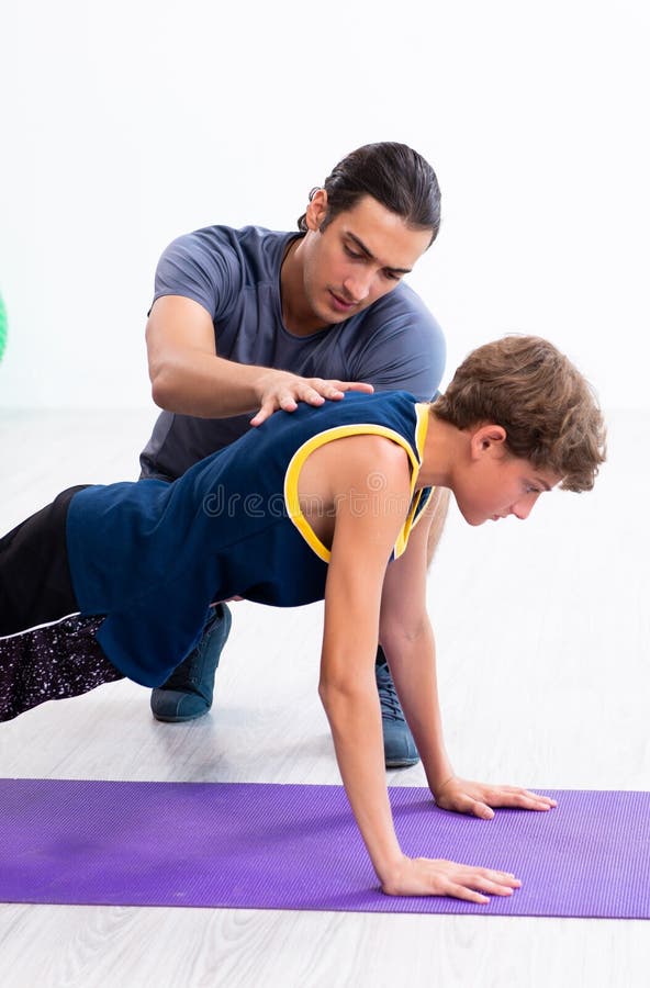 Young Father and His Son Doing Exercises Stock Photo - Image of ...