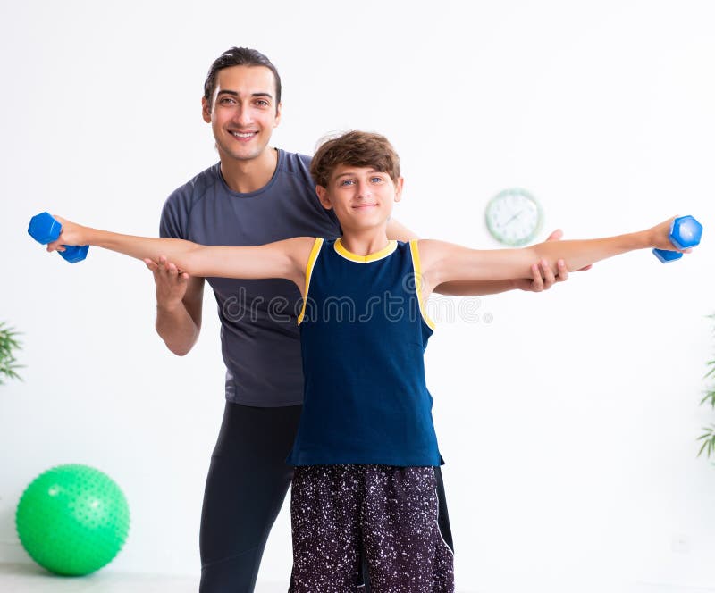 Young Father and His Son Doing Exercises Stock Image - Image of ...