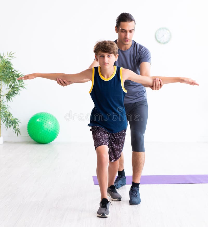 Young Father and His Son Doing Exercises Stock Image - Image of body ...