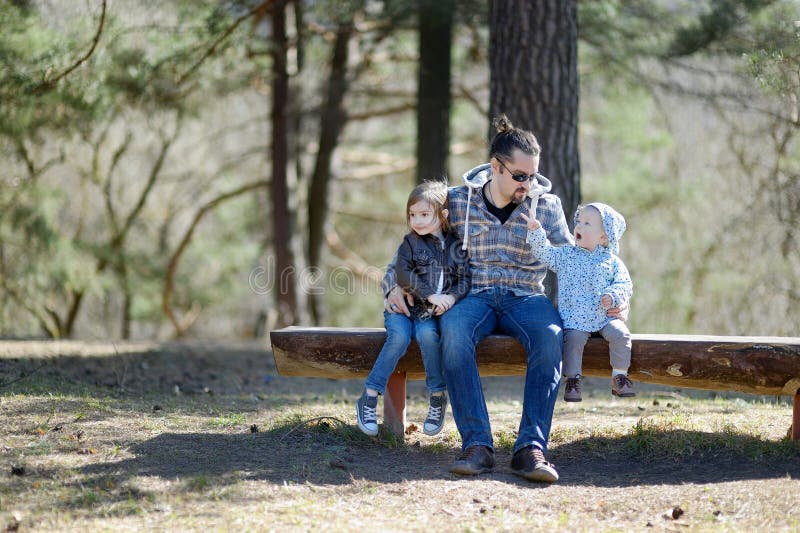 Young Father and His Two Daughters Stock Image - Image of siblings ...
