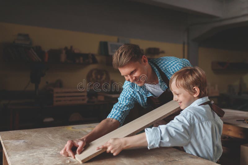 Young Father and a Little Son at Work Stock Photo - Image of people ...