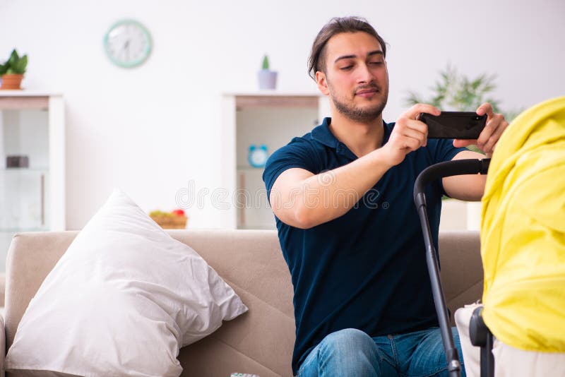 Young Father Looking after Newborn Stock Image - Image of parenting ...