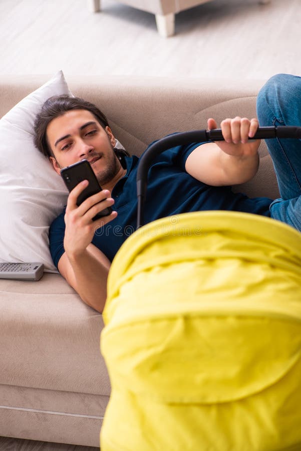Young Father Looking after Newborn Stock Photo - Image of epidemic ...