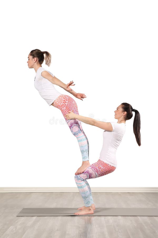 Young Female Acrobats in Beautiful Acrobatic Poses Stock Photo - Image ...