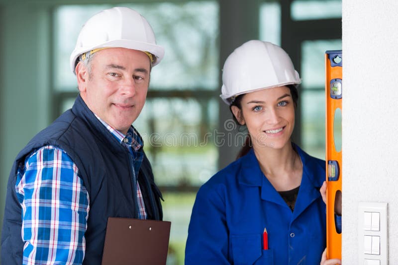 Young Female Apprentice Posing with Mentor Stock Image - Image of ...