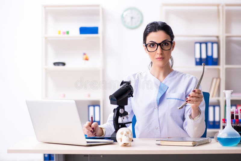The Young Female Archaeologist Working in the Lab Stock Image - Image ...
