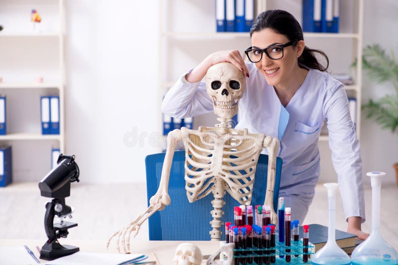The Young Female Archaeologist Working in the Lab Stock Image - Image ...