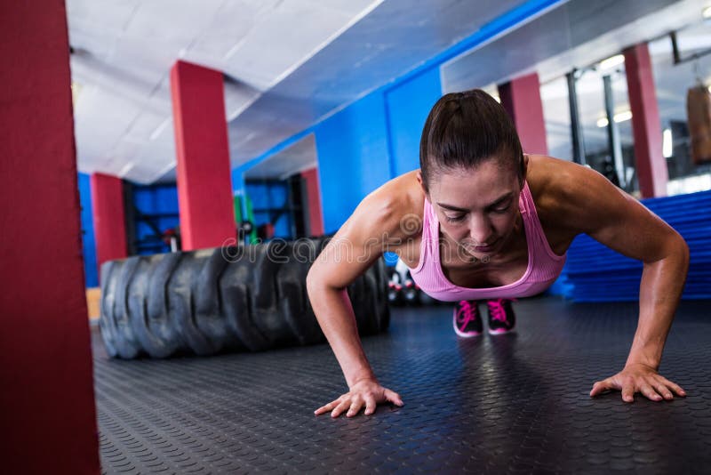 Young Female Athlete Doing Push-ups Stock Photo - Image of self, front ...