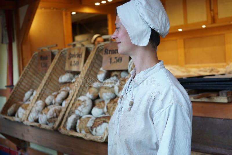 Young female baker editorial photography. Image of chef - 117154647