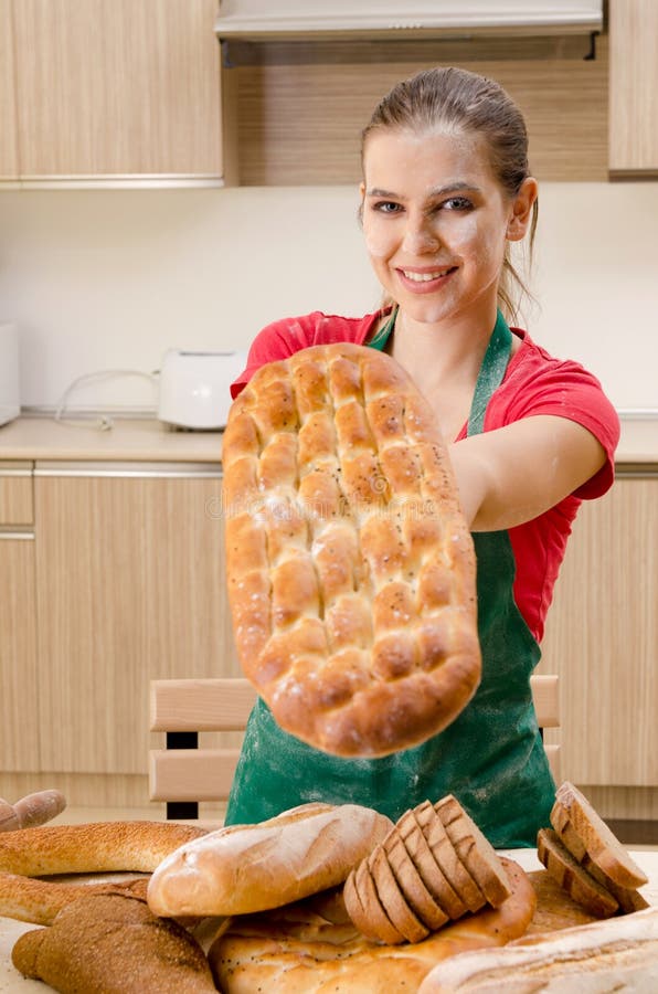 The Young Female Baker Working in Kitchen Stock Image - Image of ...