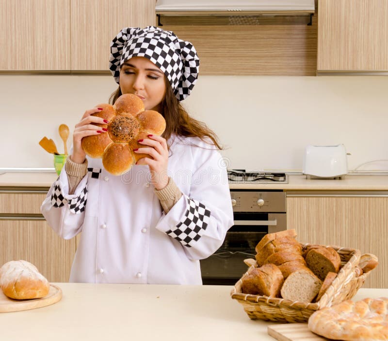 Young Female Baker Working in Kitchen Stock Image - Image of flour ...