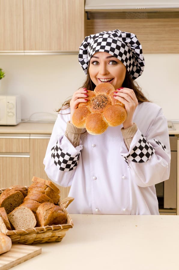 The Young Female Baker Working in Kitchen Stock Image - Image of bread ...