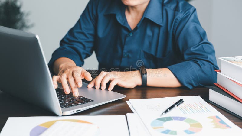 A Young Female of Banking Manger Using Calculator, Computer Laptop ...