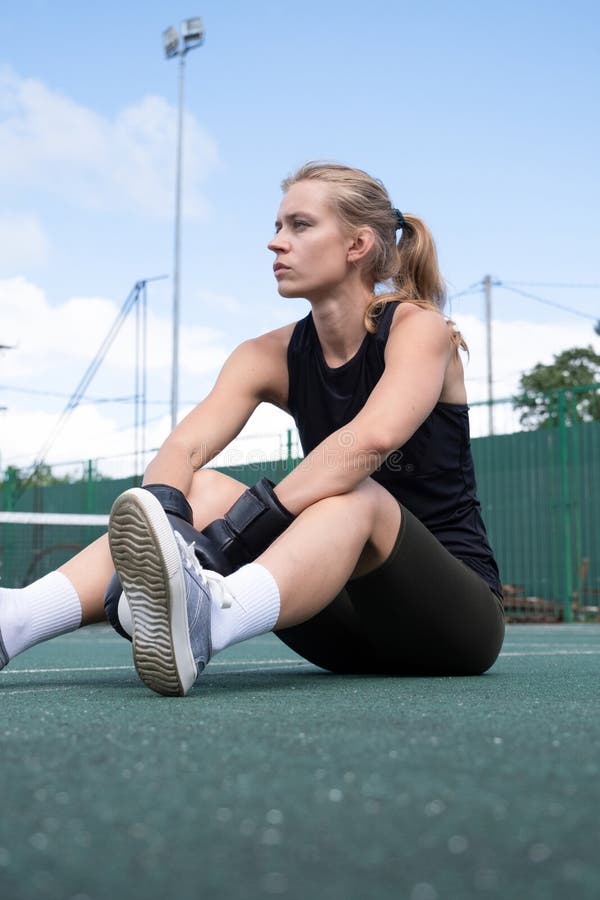 Young Female Boxer Training in the Stadium, Having Rest Sitting Stock ...