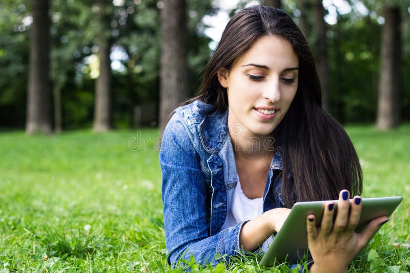 Young Female Browsing on Digital Tablet Stock Image - Image of casual ...